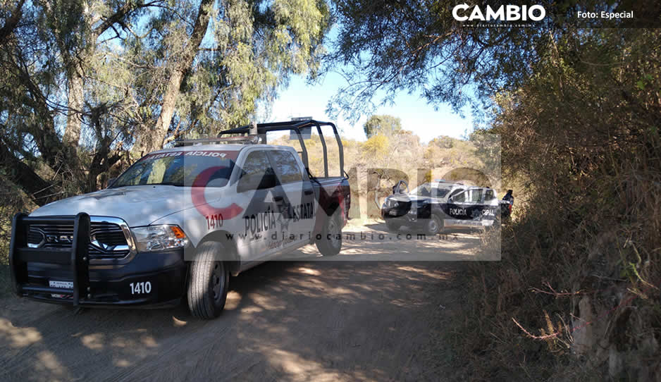 Hallan camioneta con cuerpo calcinado en Texmelucan